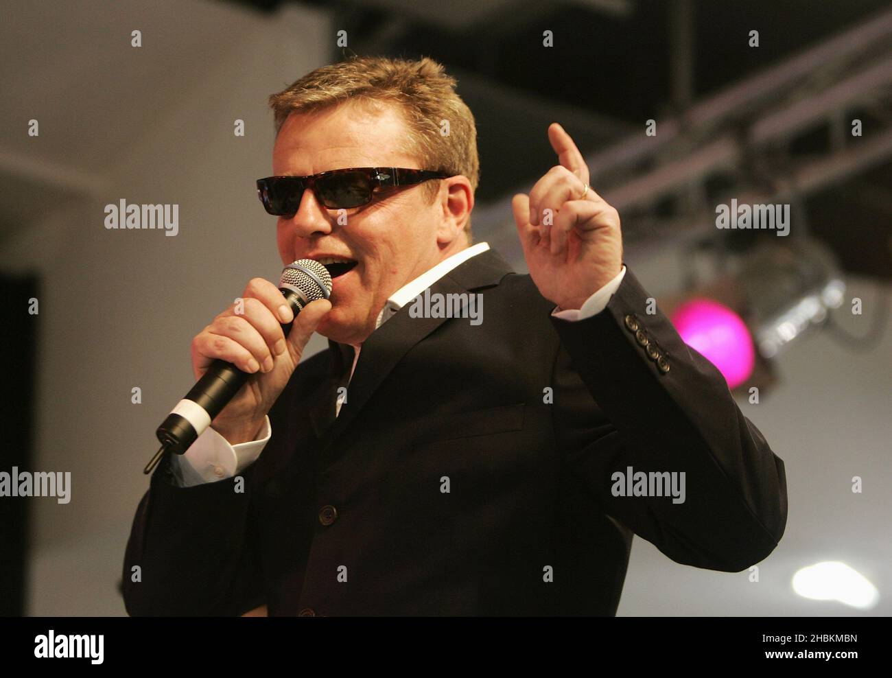 Suggs performs with his band Madness on stage at HMV on Oxford Street ...