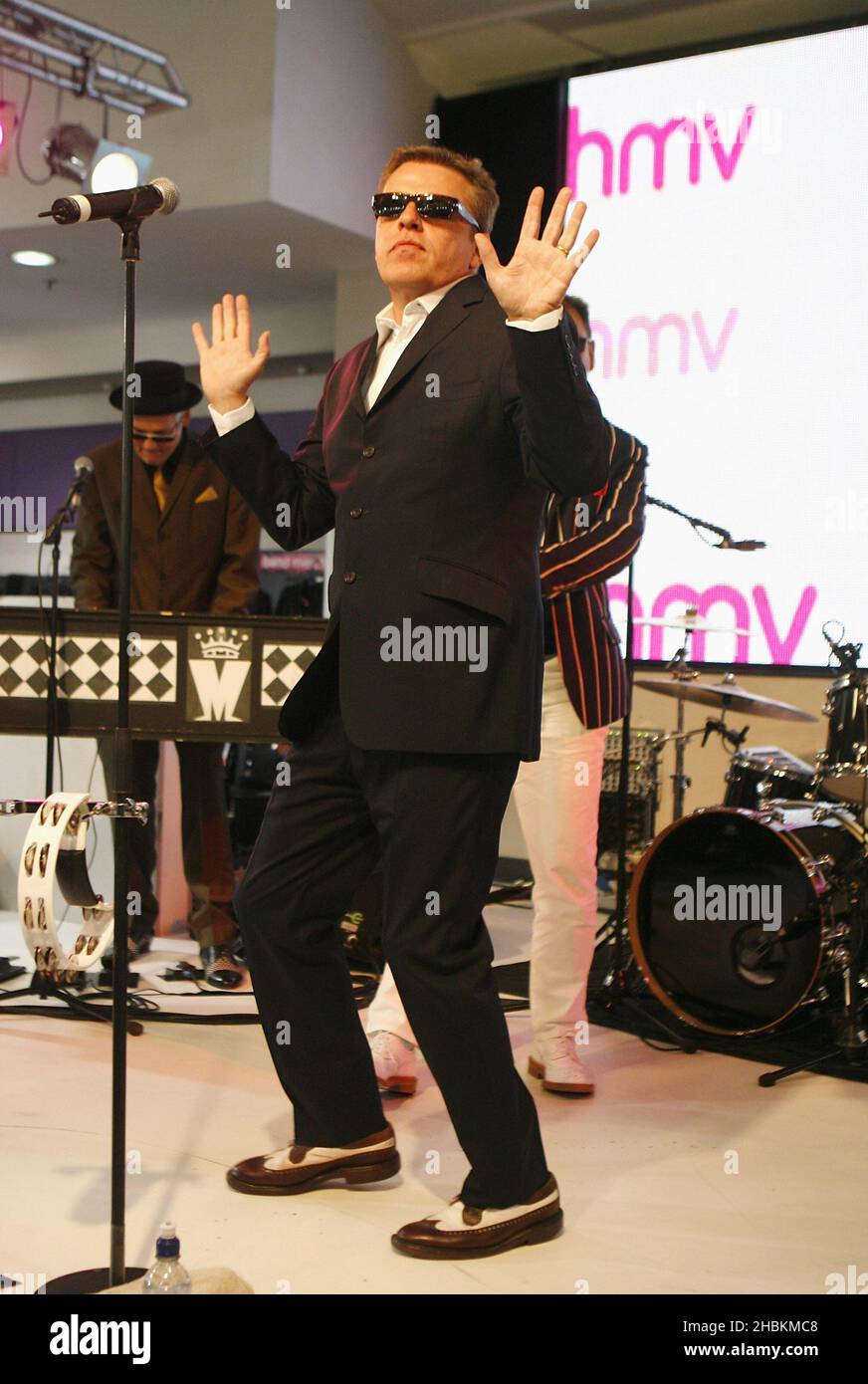 Suggs and his band Madness perform at HMV signing, Oxford Street ...