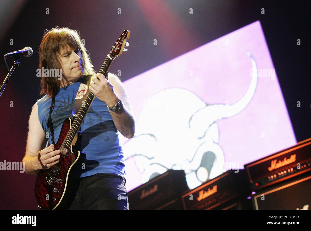 Nigel Tufnel (Christopher Guest) of Spinal Tap performs on stage at ...