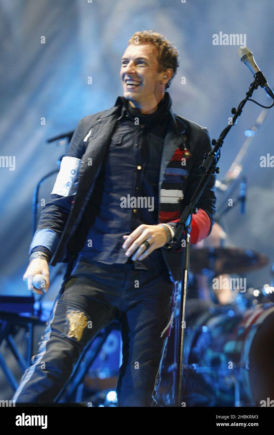 Chris martin of coldplay performs on stage at wembley stadium hi-res ...