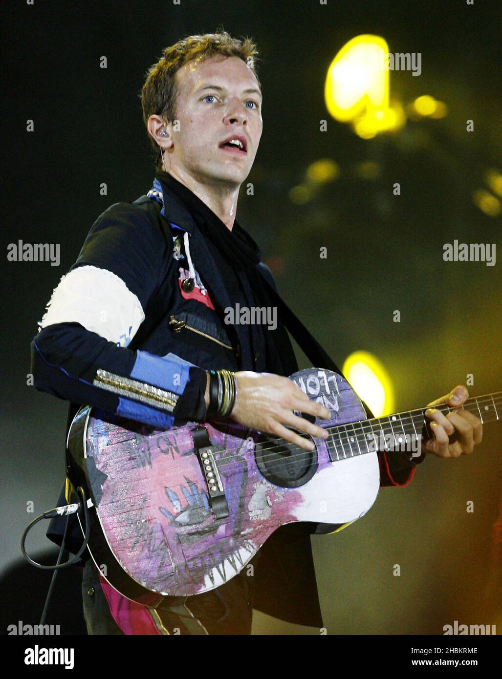 Chris Martin of Coldplay performs on stage at Wembley Stadium, North ...