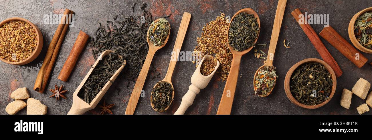 Concept of cooking tea with different types of tea on dark textured ...