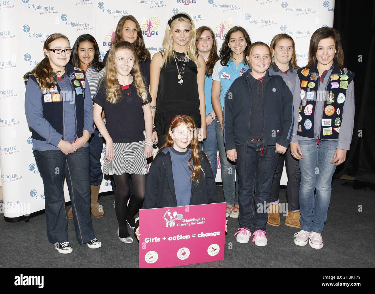 Pixie Lott poses with the Second Loughton Girlguides at the Girlguiding ...