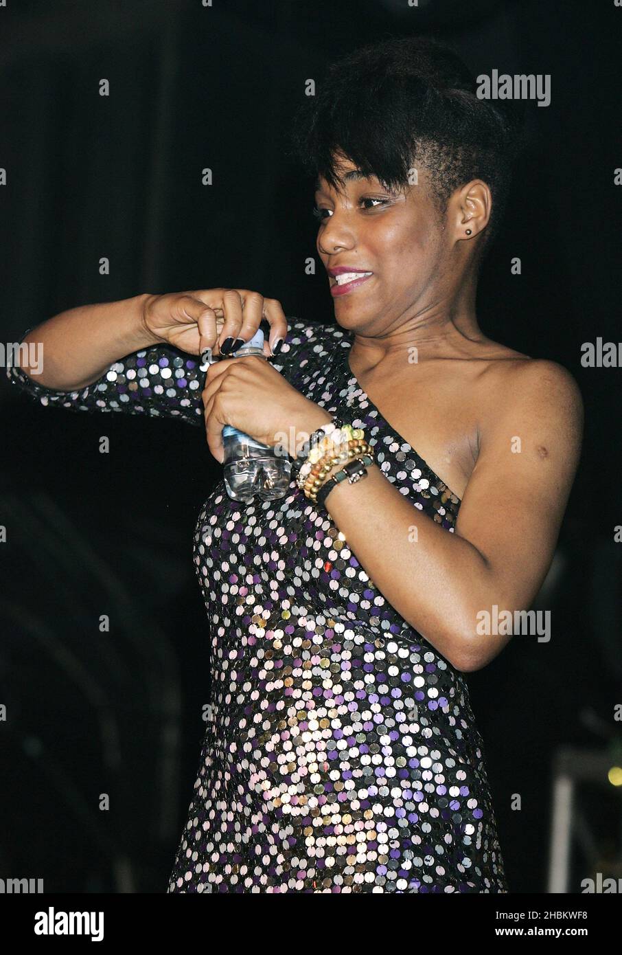 2009 X Factor finalist Rachel Adedeji performs on stage with JLS at G-A ...