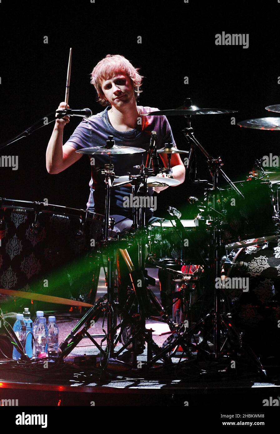Dominic Howard of Muse perform on stage at the 02 Arena, London Stock ...