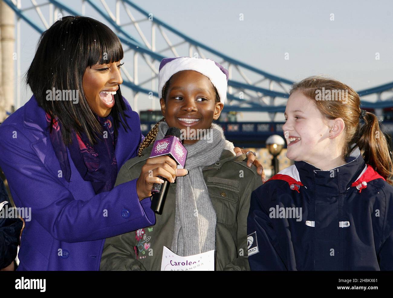 Alexandra Burke sings with the Quality Street Christmas Carol Singers ...