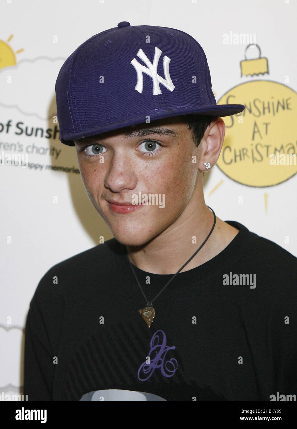 George Sampson poses backstage at the Sunshine at Christmas Party at ...
