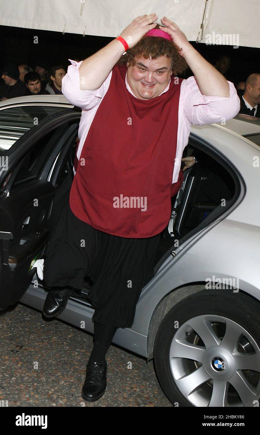 Actor Steve Benham (in character as Heather from Eastenders) arrives at ...