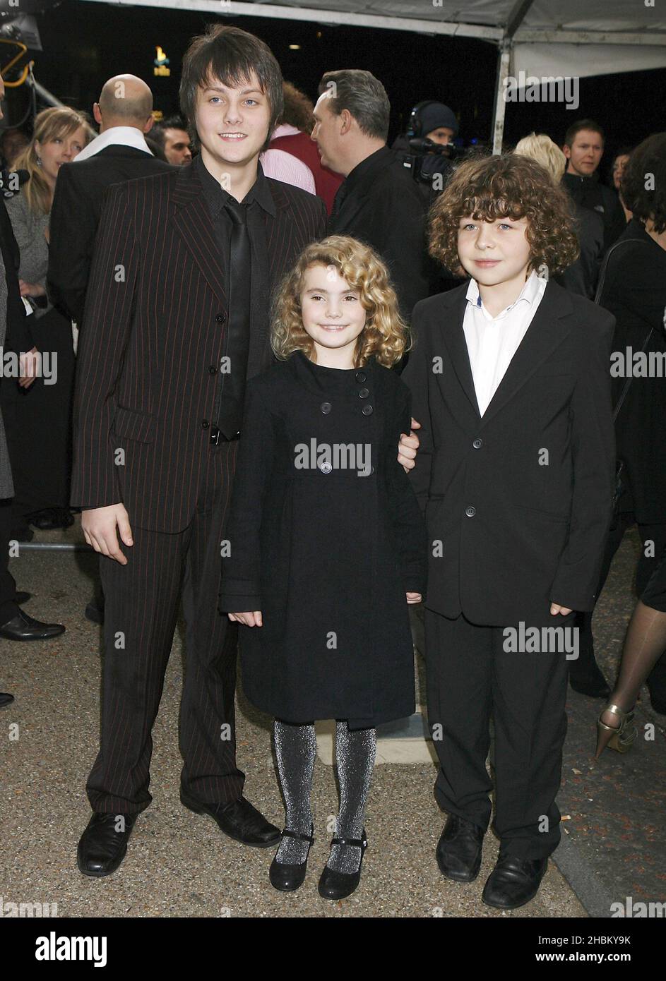 Tyger Drew Honey (left), Daniel Roche and Ramona Marquez arrive for the ...