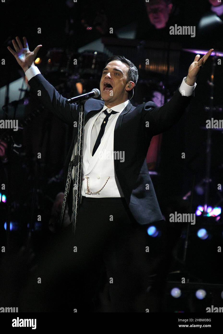 Robbie Williams performs on stage during the BRIT Awards 2010, at Earls ...