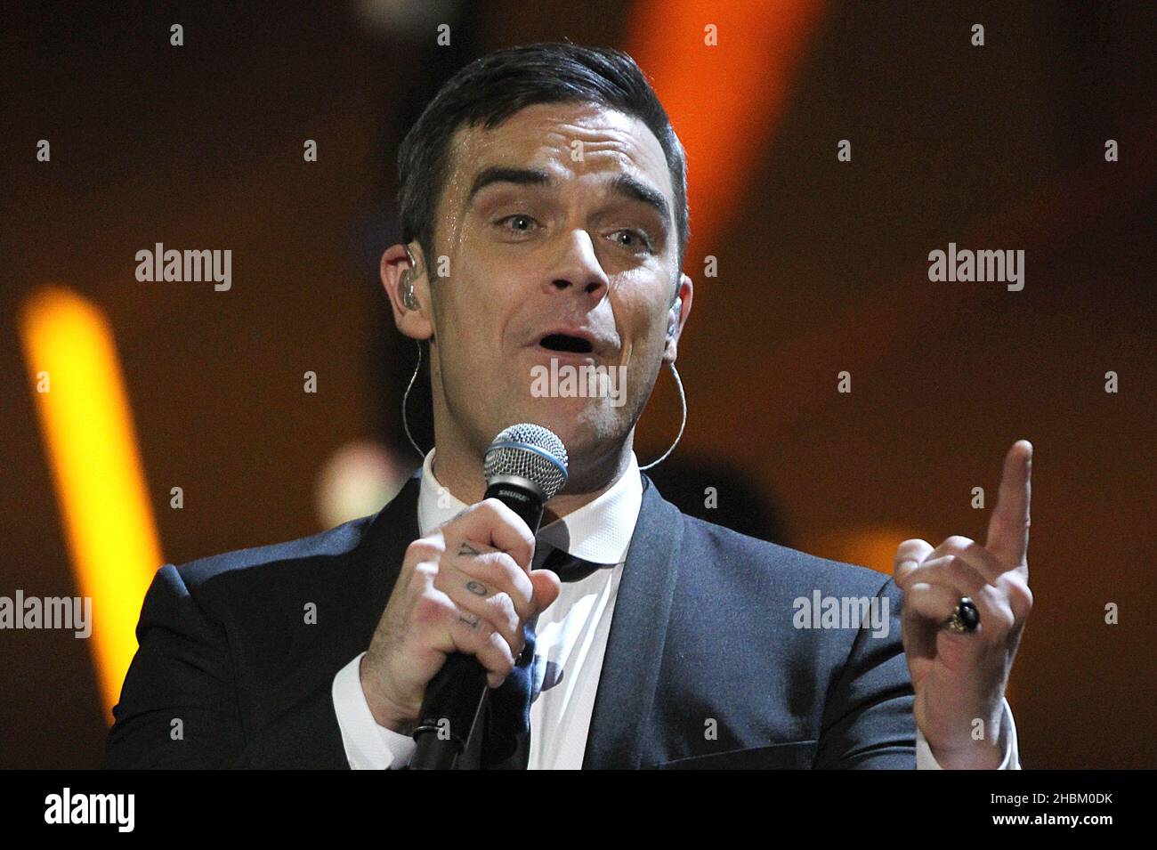 Robbie Williams performs on stage during the BRIT Awards 2010, at Earls ...