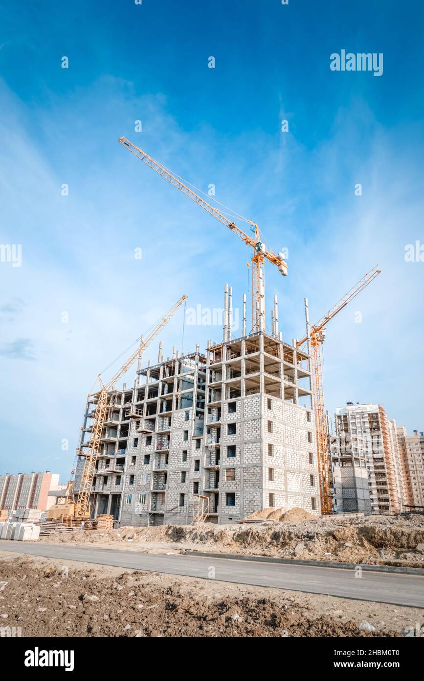 Industrial cranes and building object Stock Photo - Alamy