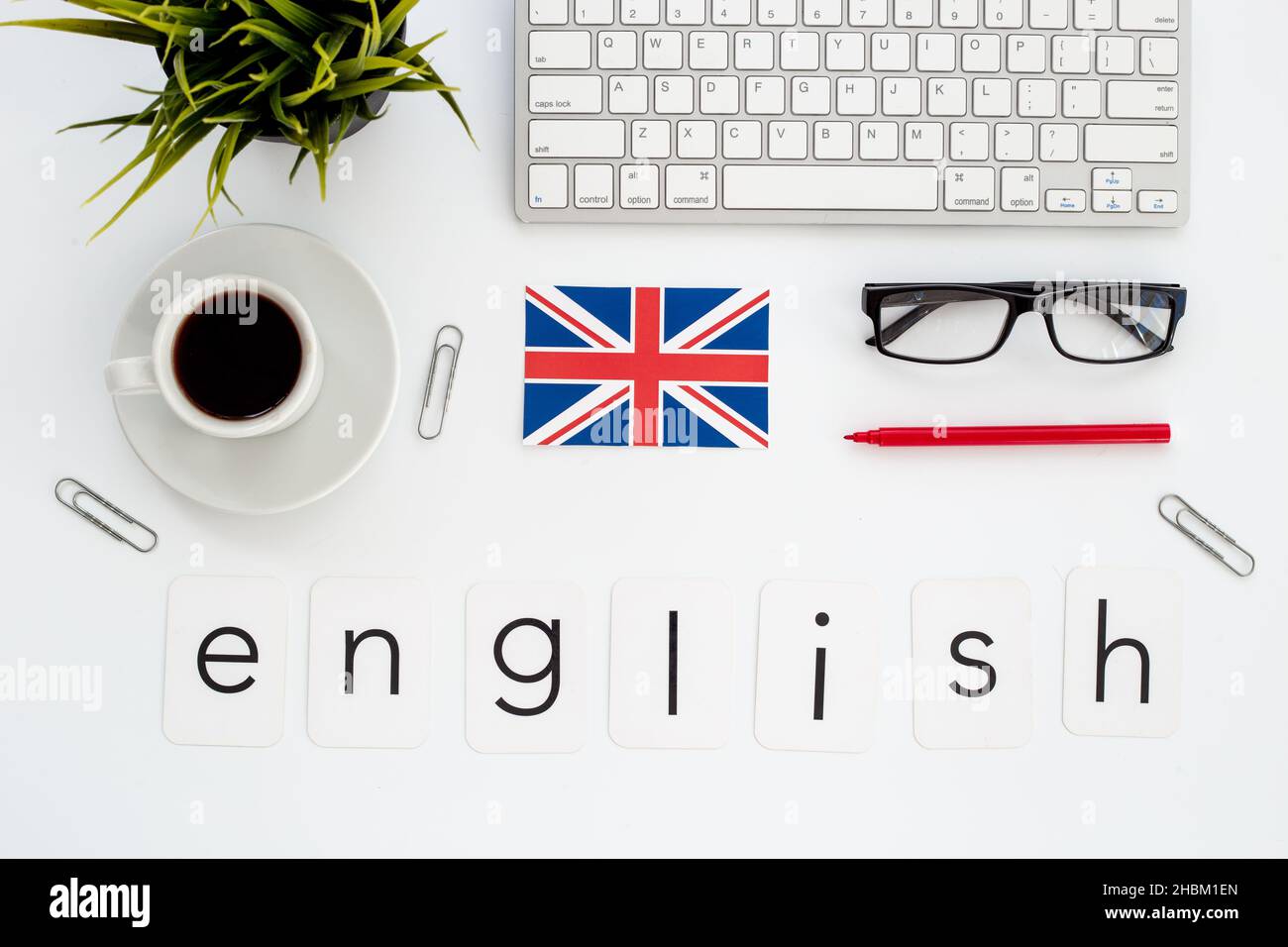 Learning English language concept. Text on student table desk, top view ...
