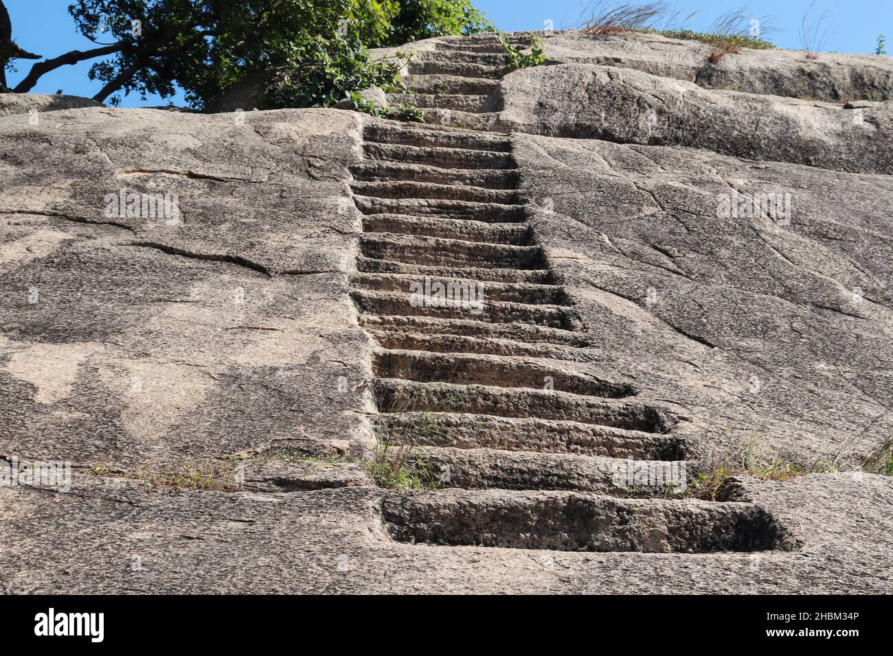 Staircase carved into the rock. Against the backdrop of rock and nature ...