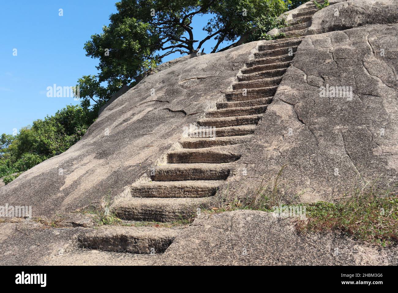 Staircase carved into the rock. Against the backdrop of rock and nature ...