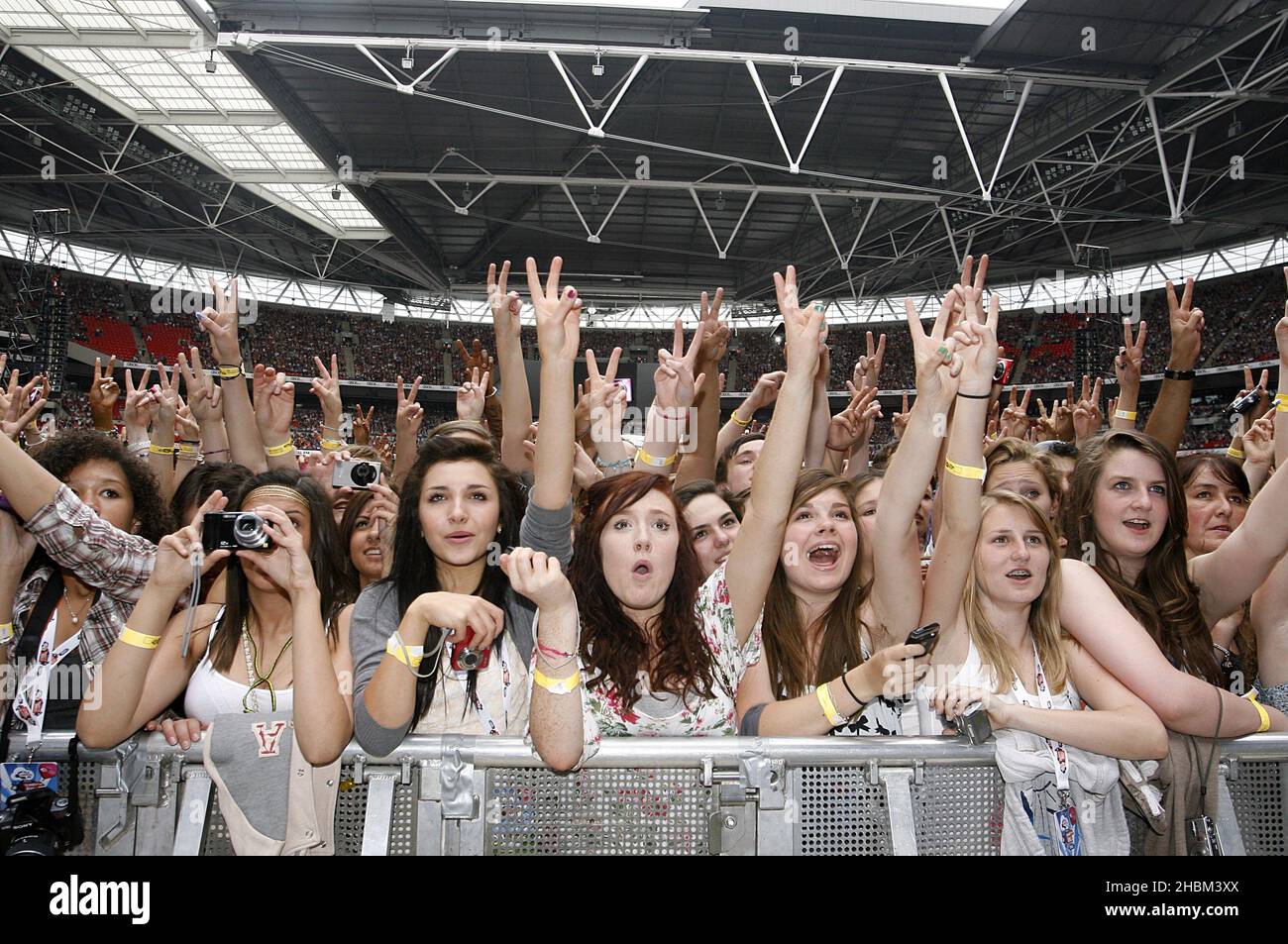 Fans watch Usher on stage during the Capital FM Summertime Ball at ...