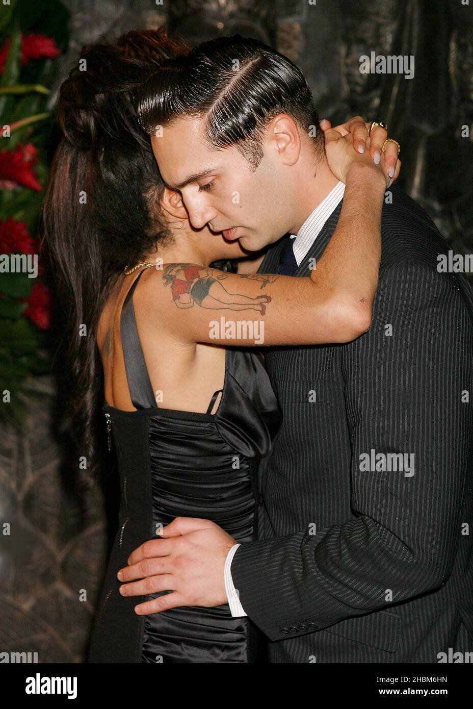 Amy Winehouse and new boyfriend Reg Traviss arrive at the Shaka Zulu ...