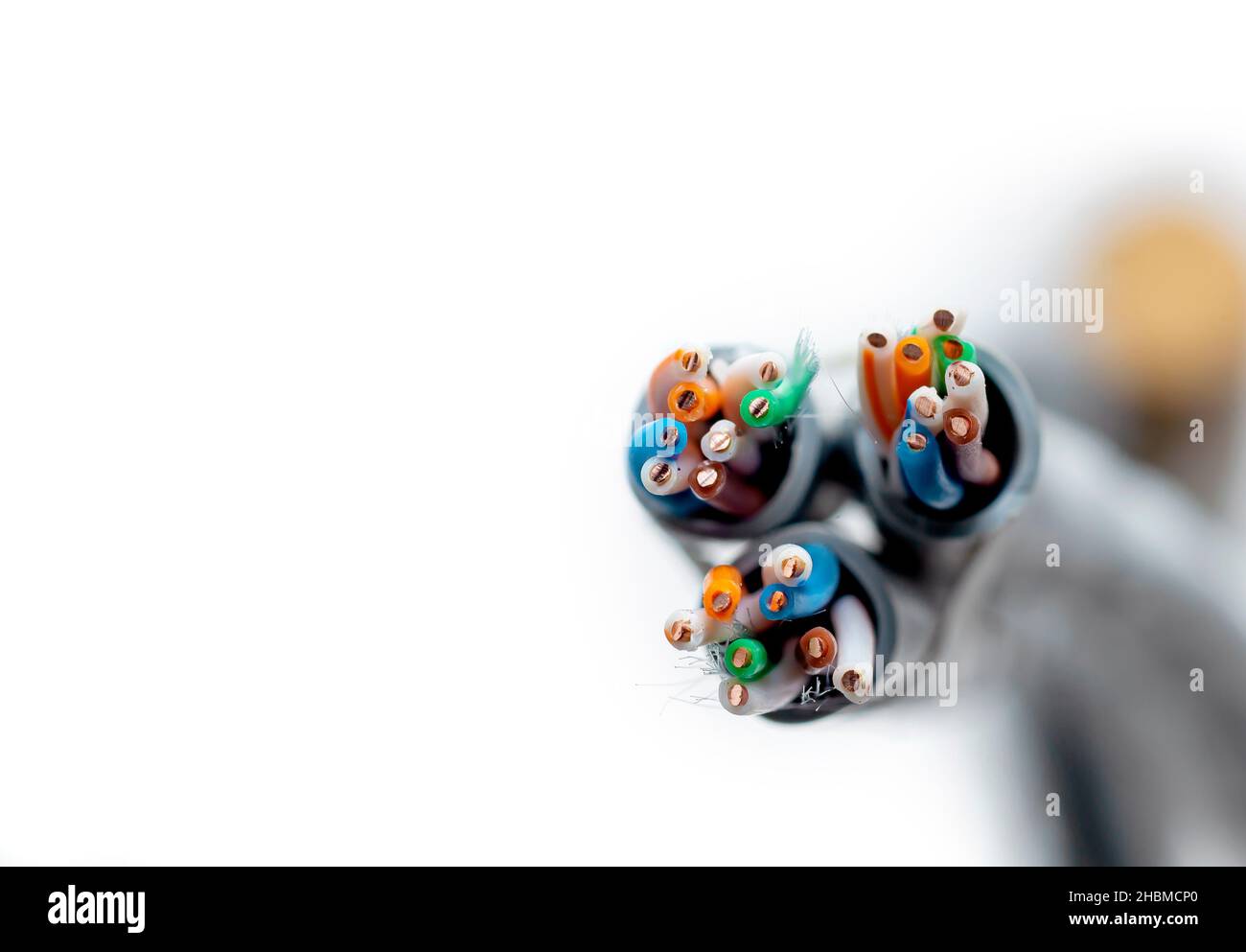 Colorful cable wire isolated over white background Stock Photo - Alamy