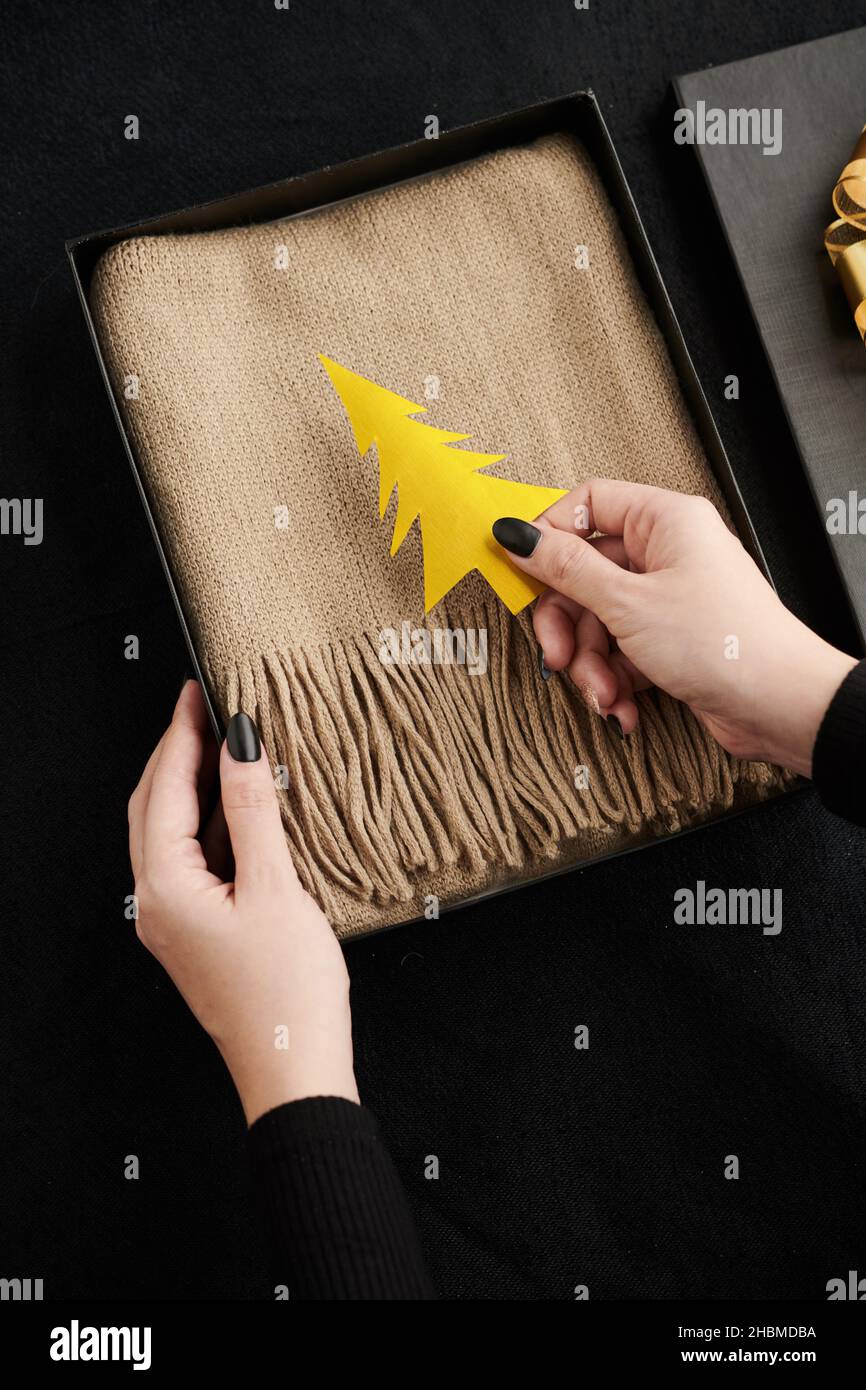 Woman adding paper christmas hi-res stock photography and images - Alamy
