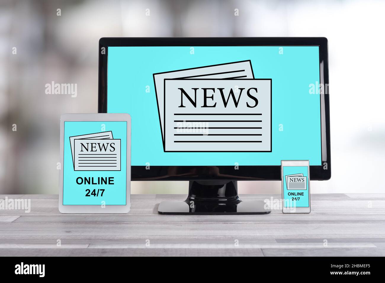 News concept shown on different information technology devices Stock ...