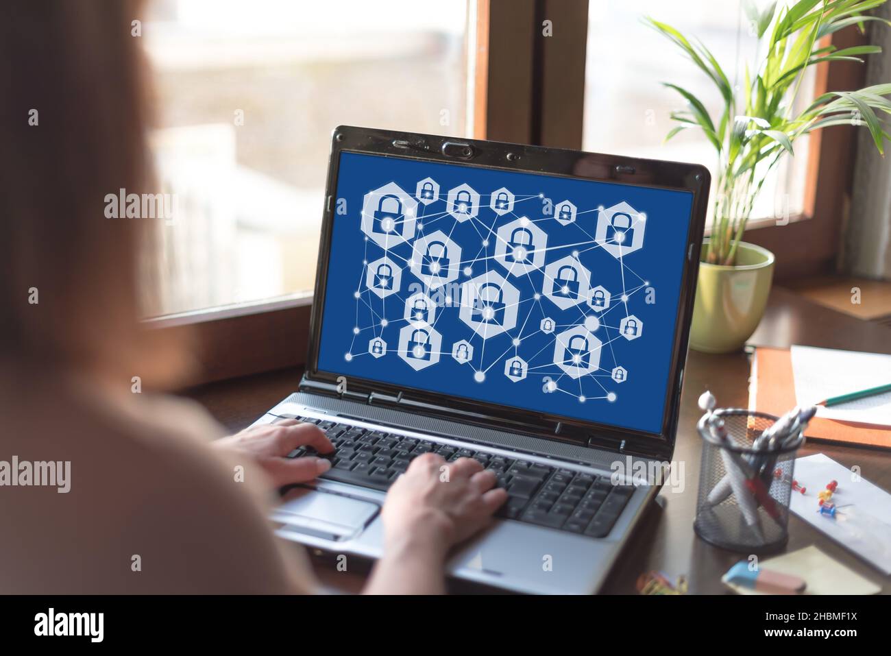 Laptop screen displaying a network safety concept Stock Photo - Alamy