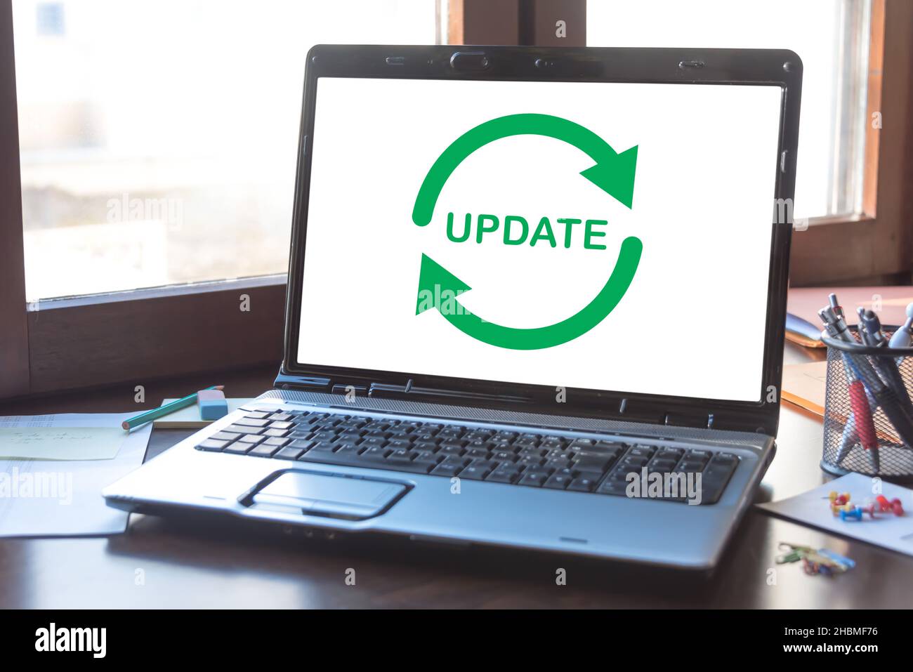 Laptop screen displaying an update concept Stock Photo - Alamy