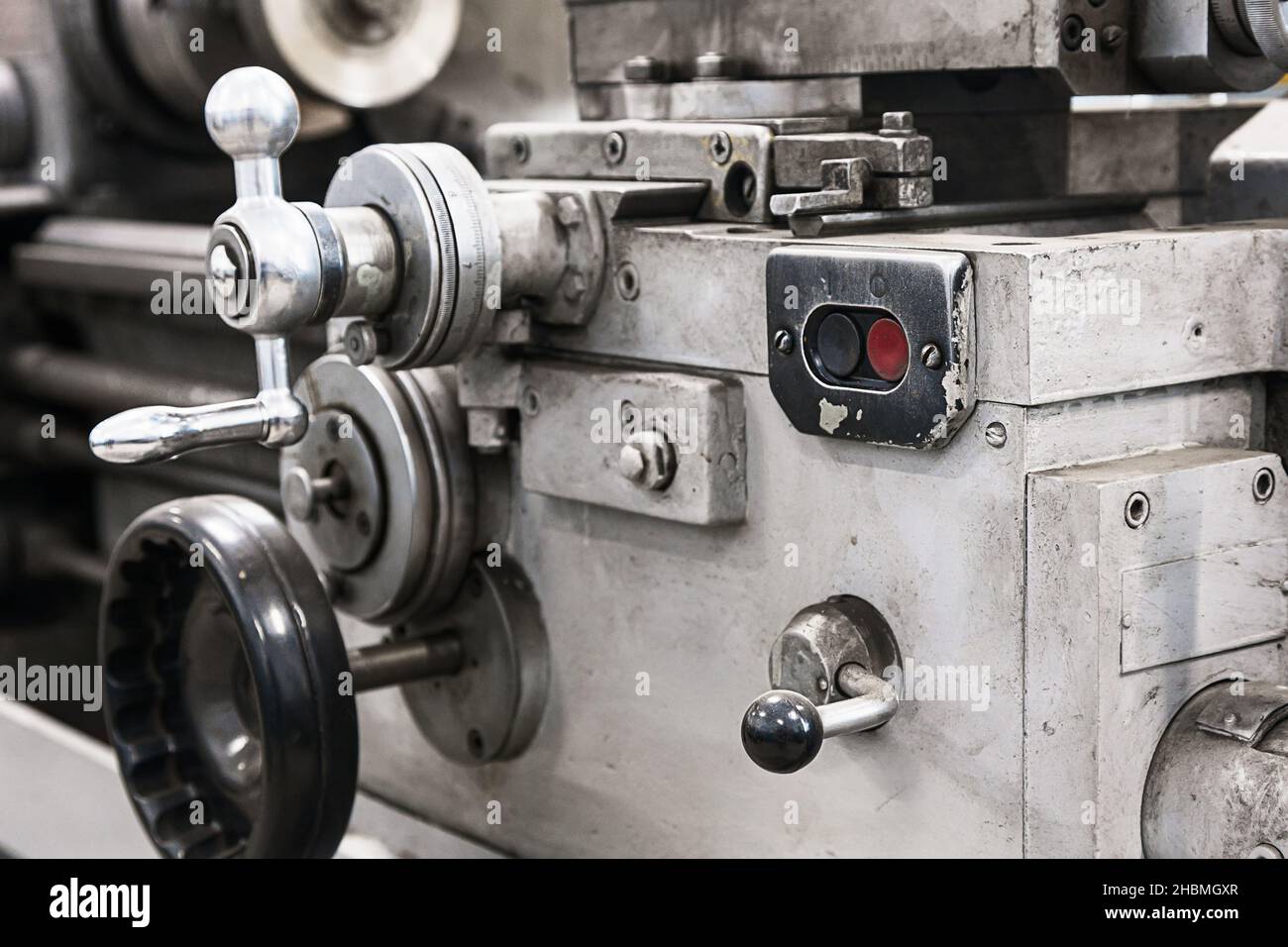 Part of lathe in workshop is close-up. Old lathe for metal processing ...