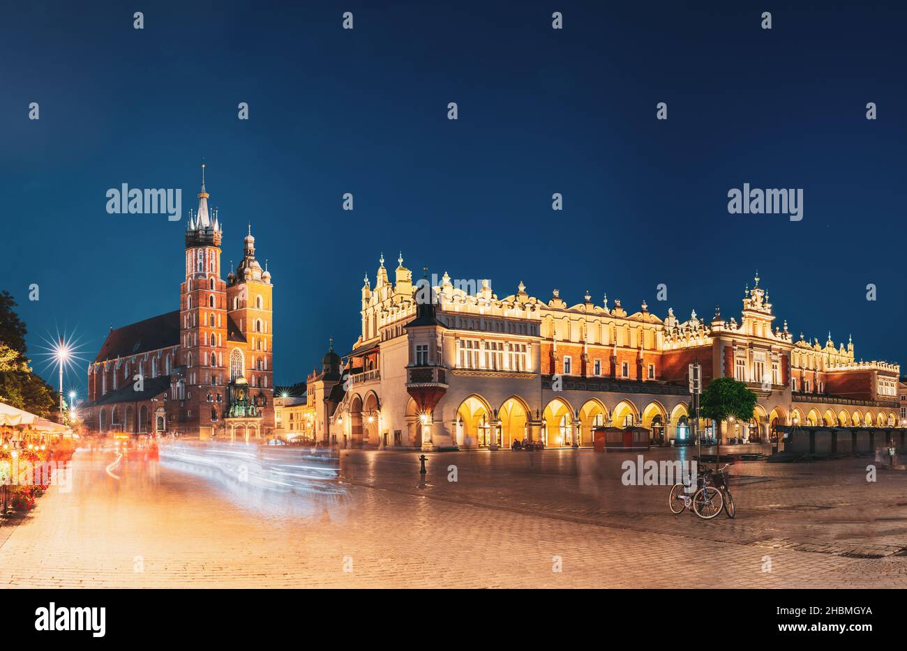 Krakow, Poland. Famous Landmarks On Old Town Square In Summer Evening ...