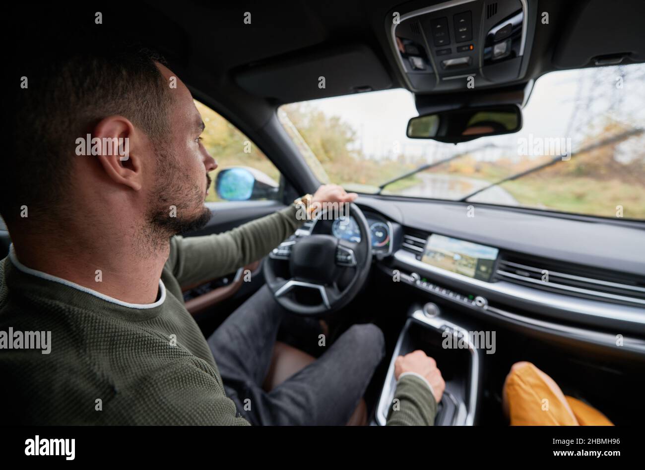 Driver behind wheel of car hi-res stock photography and images - Alamy