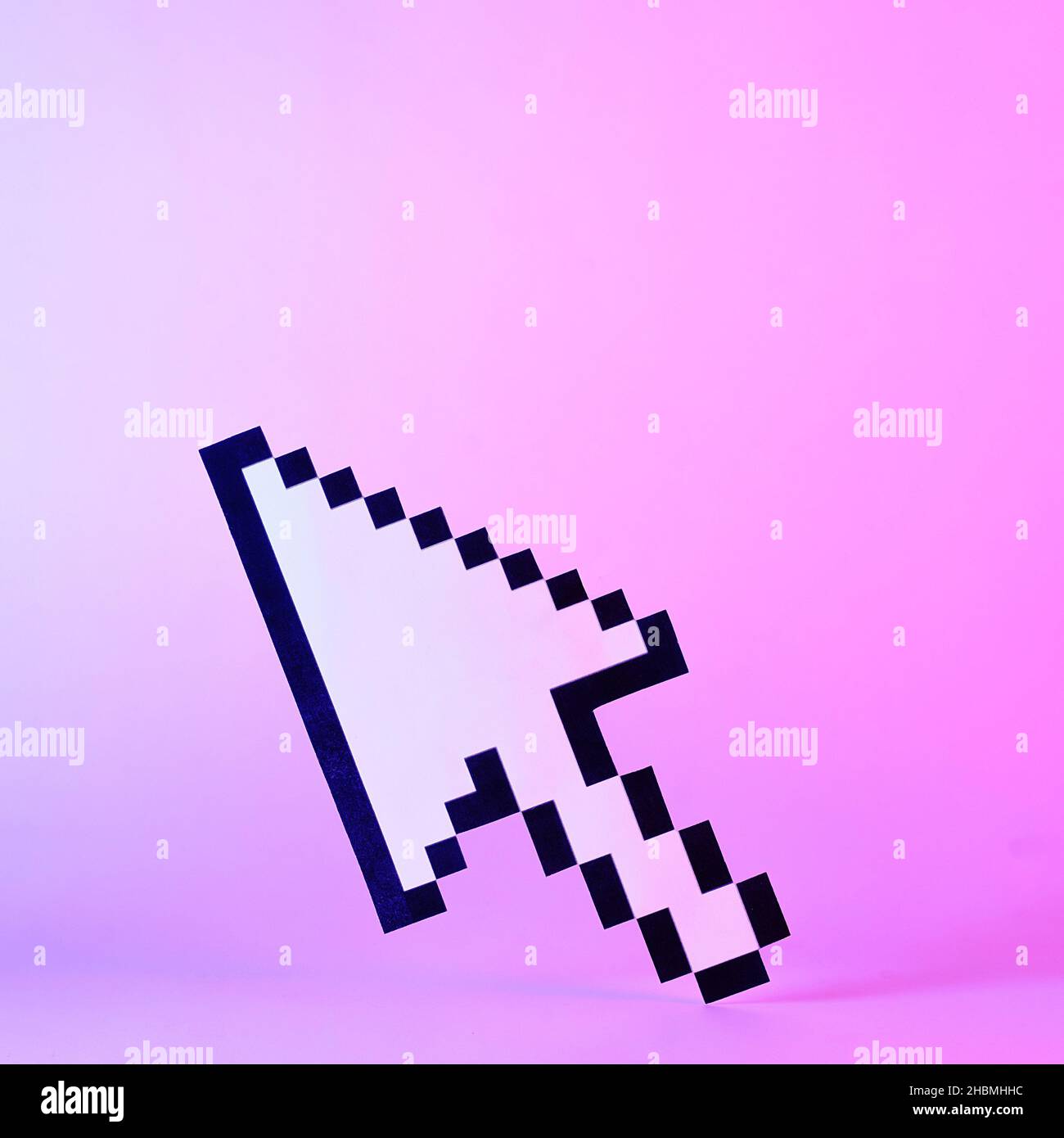 Digital pointer or arrow on a graduated purple background with copy ...