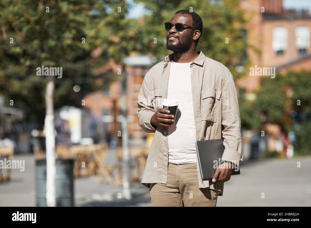 Business person walking towards camera hi-res stock photography and ...