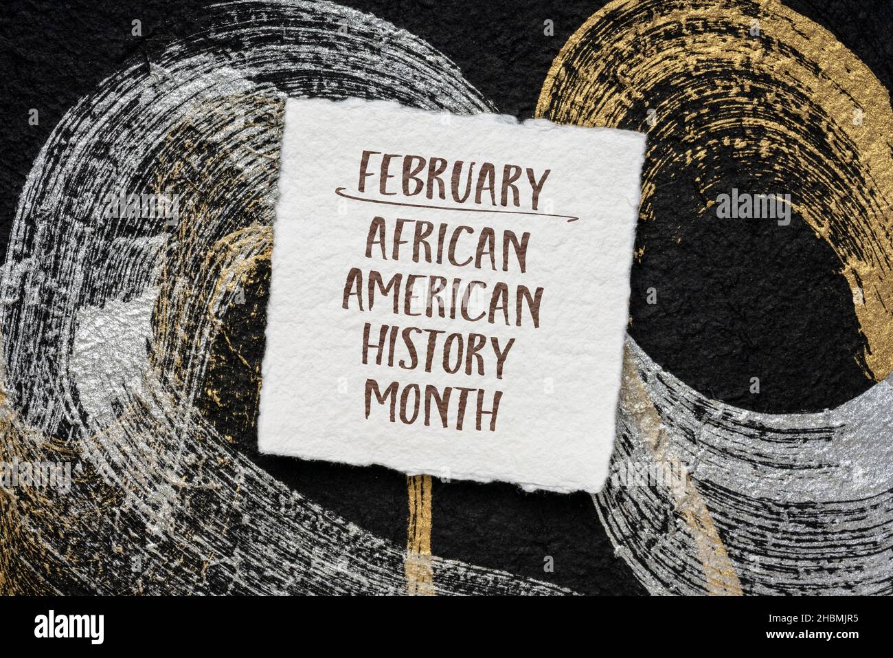 February - African-American History Month, handwriting against abstract ...