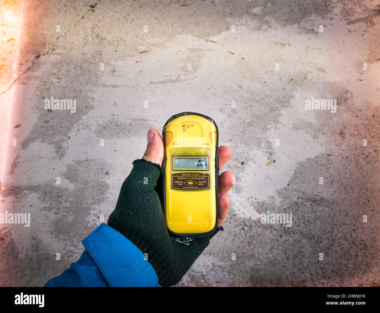 Background image of cement and radiation around dosimeter/ geiger ...
