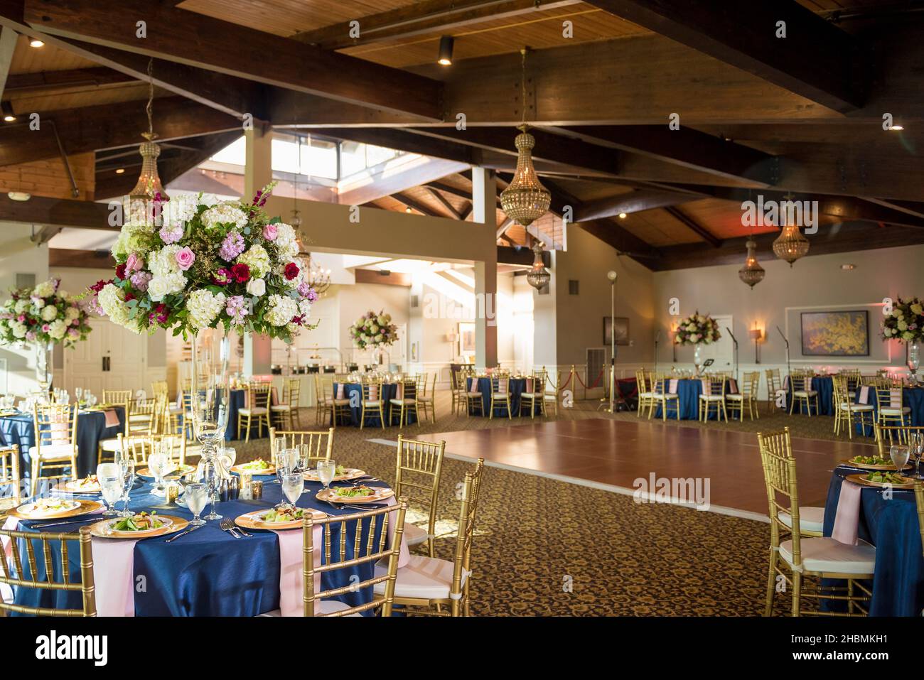 A view of the banquet hall with beautiful decorations and delicious ...