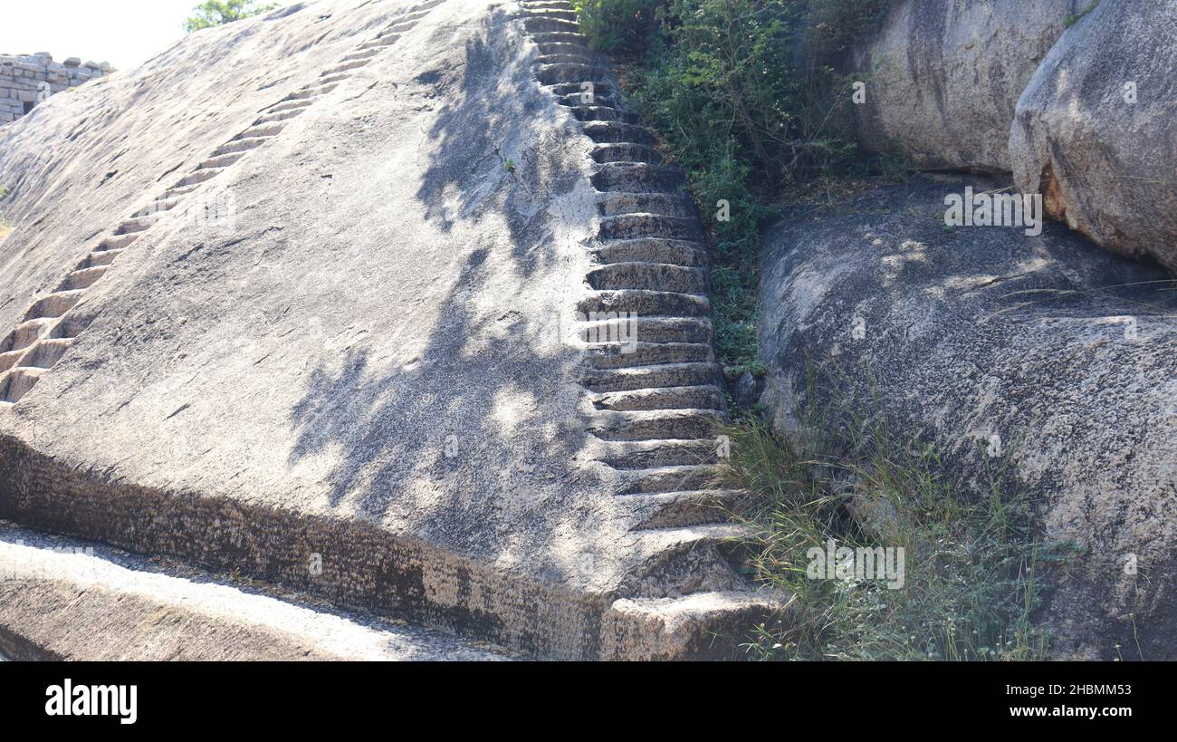 Staircase carved into the rock. Against the backdrop of rock and nature ...