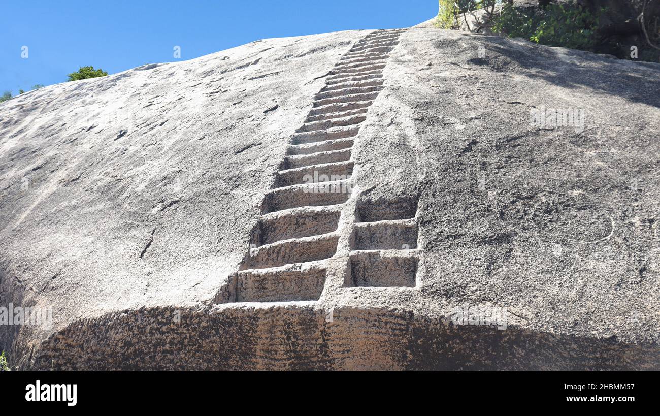 Staircase carved into the rock. Against the backdrop of rock and nature ...