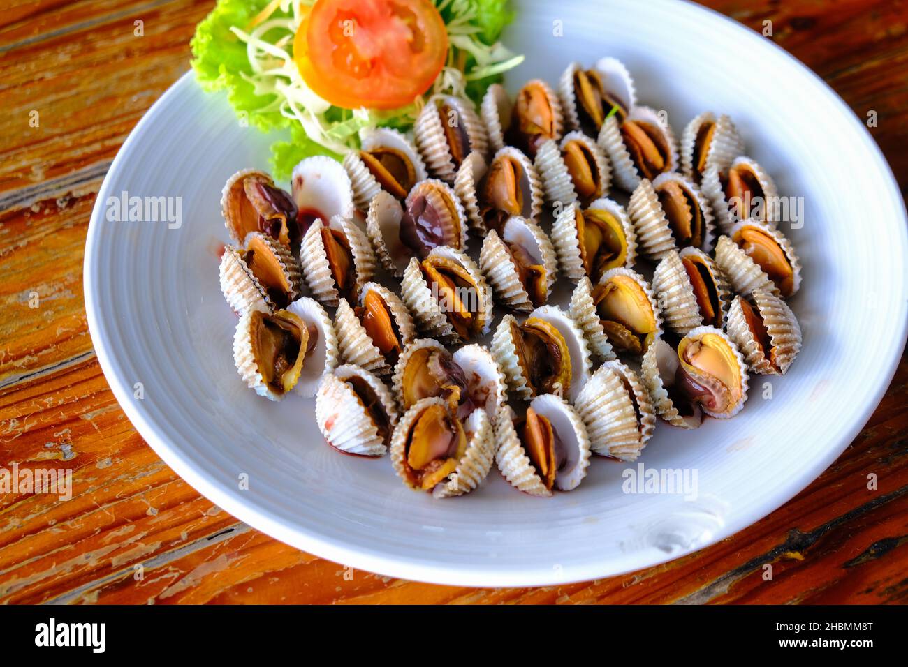 Cockle shell boiled serve with spicy sauce seafood object Stock Photo ...