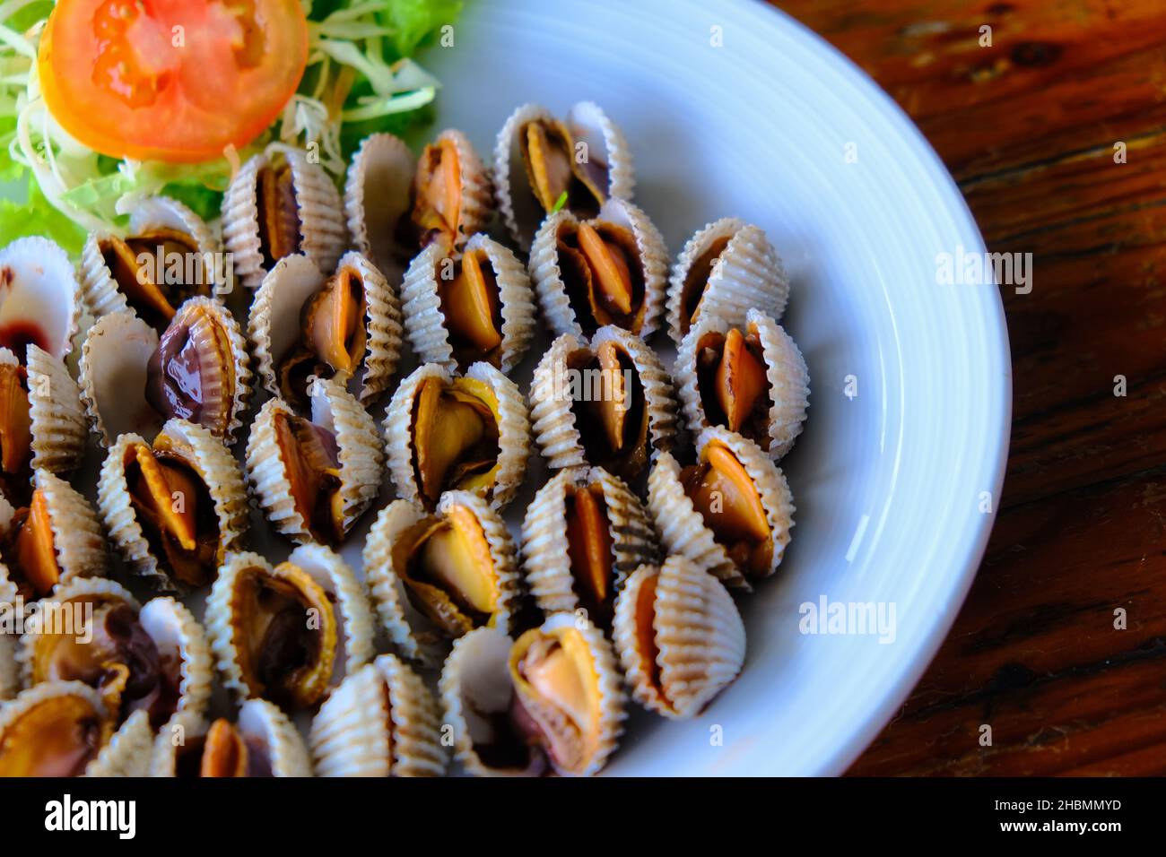 Cockle shell boiled serve with spicy sauce seafood object Stock Photo ...