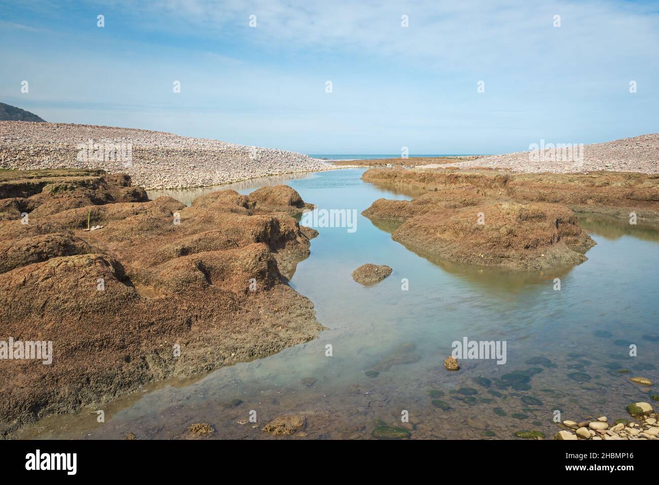 A scenic springtime view across the salt marshes in Porlock Bay in ...