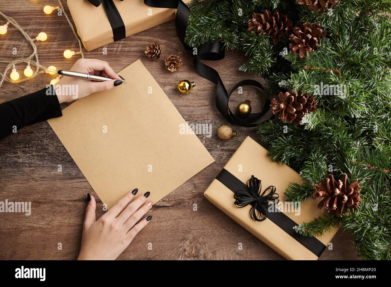 Writing young left handed woman hi-res stock photography and images - Alamy