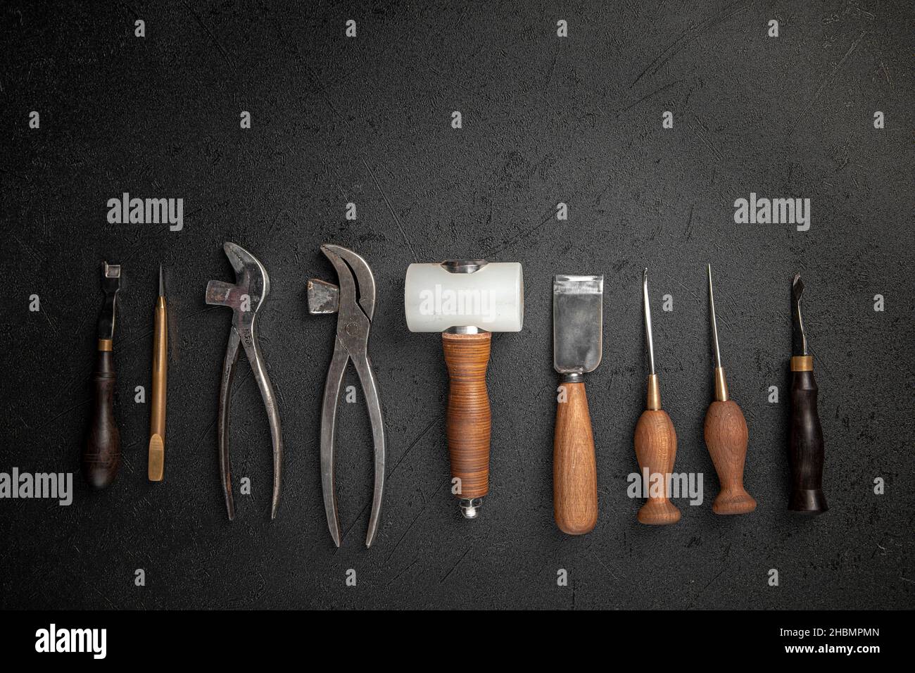 Set of leather craft cobbler tools Stock Photo - Alamy