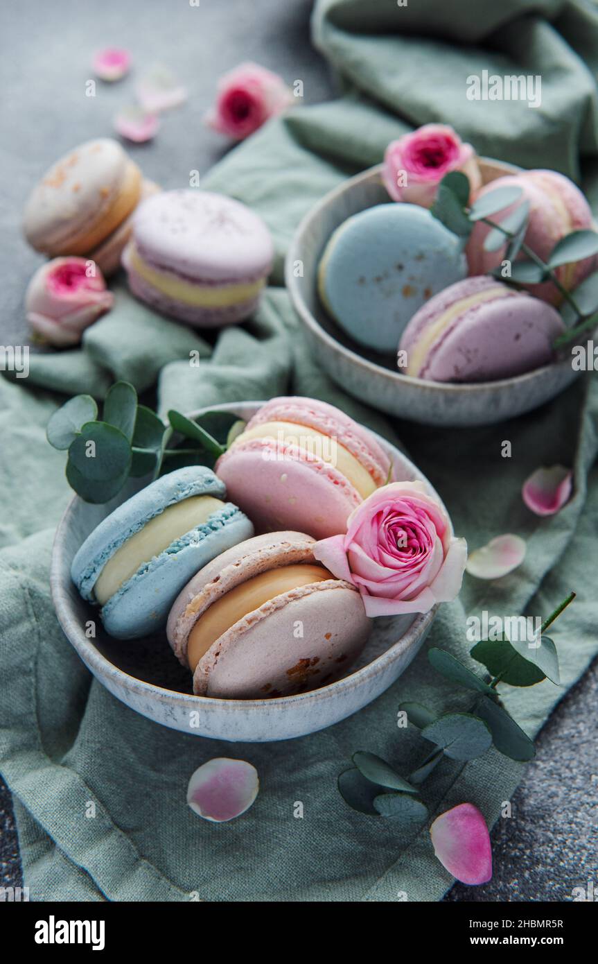 Tasty macaroons beautiful roses hi-res stock photography and images - Alamy