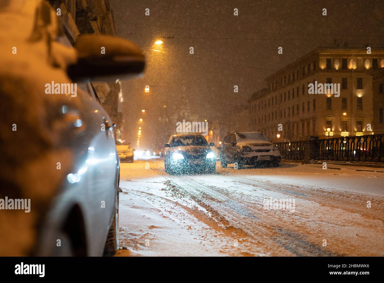 Transport collapse during winter snowfall at night, snow blizzard ...