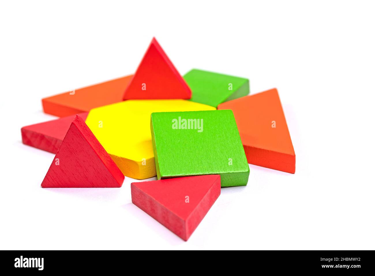 Colorful wooden blocks against a white background Stock Photo - Alamy