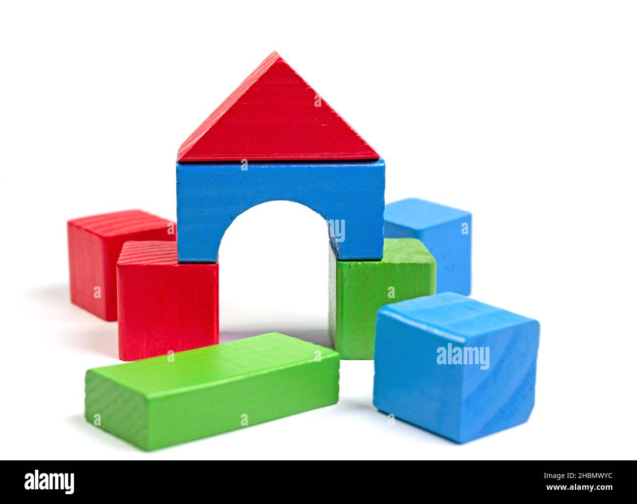 Wooden building blocks against a white background Stock Photo - Alamy