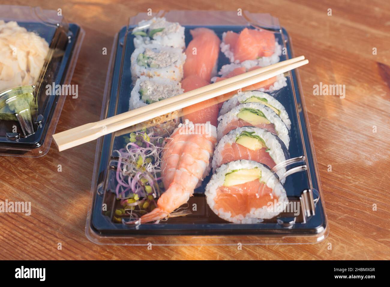 SUSHI IN BOX LUNCHES, NATURAL LIGHT. FRESH Stock Photo - Alamy