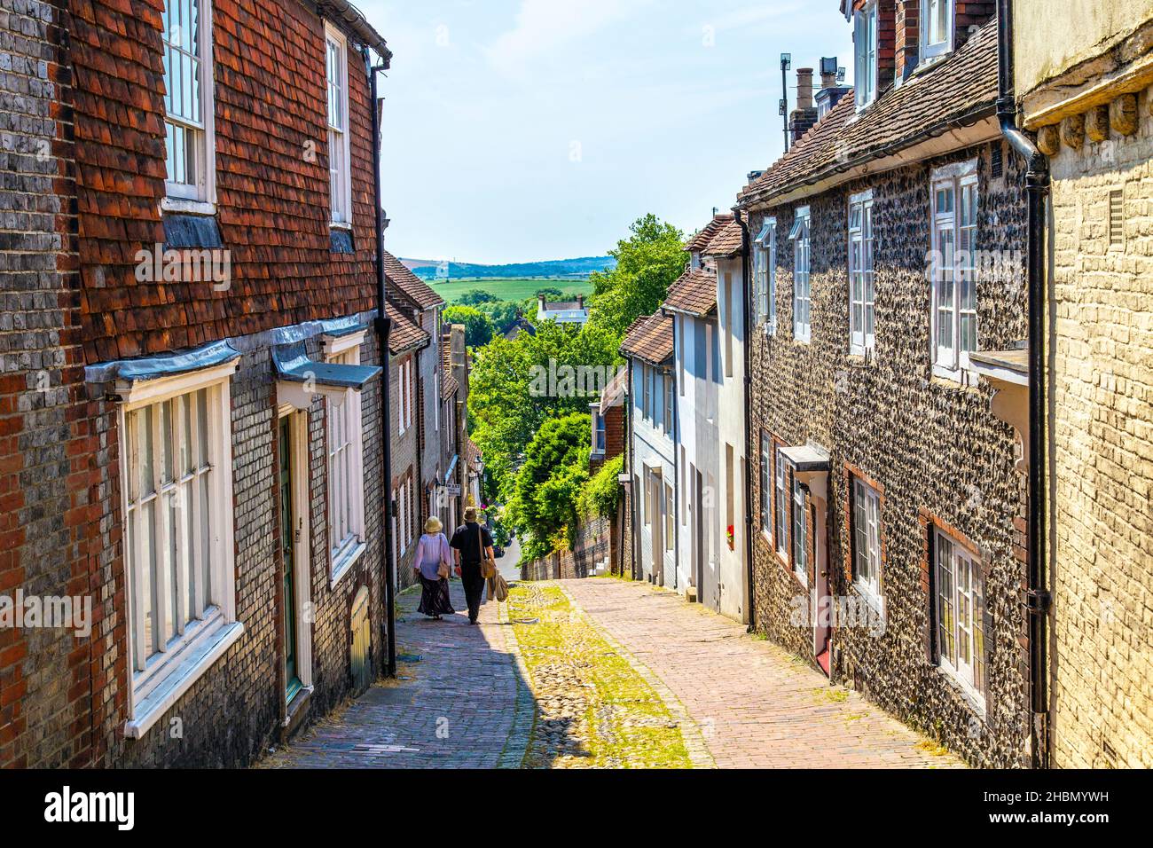 Charming cobblestone street lined with houses in Lewes, South Downs, UK ...