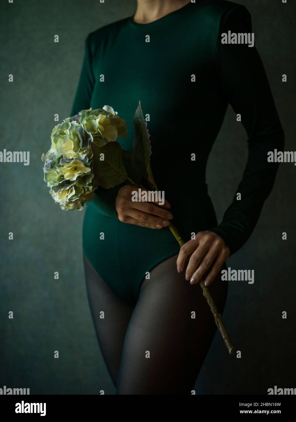 Female body with a flower Stock Photo - Alamy