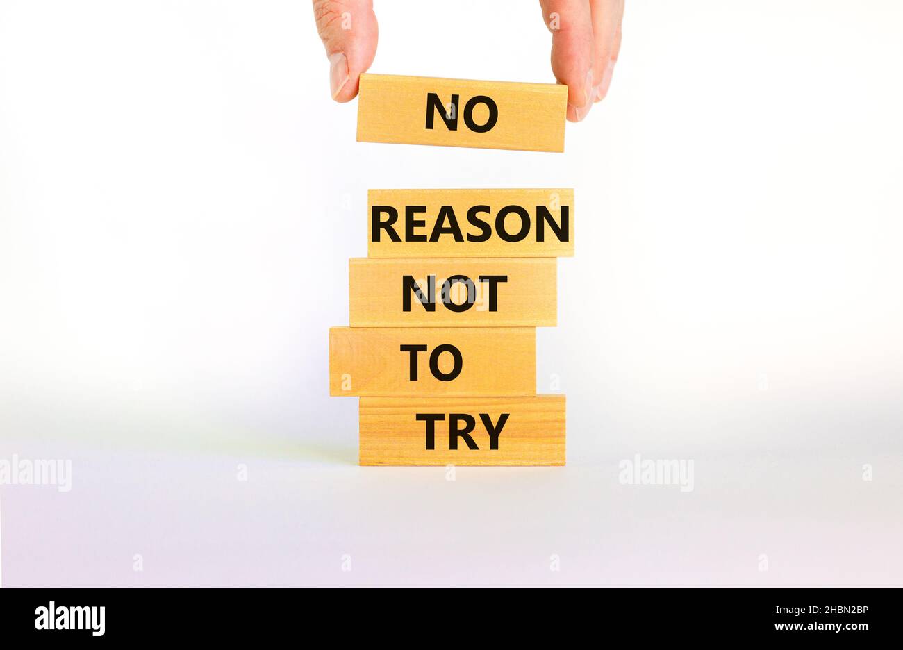 No reason not to try symbol. Wooden blocks with words No reason not to ...