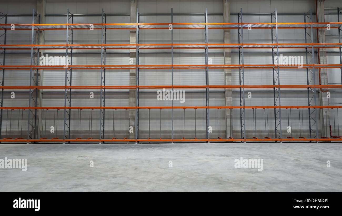 logistics warehouse with empty high racks Stock Photo - Alamy
